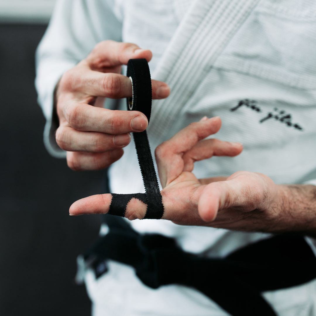 How and Why Do BJJ Fighters Tape Their Fingers?