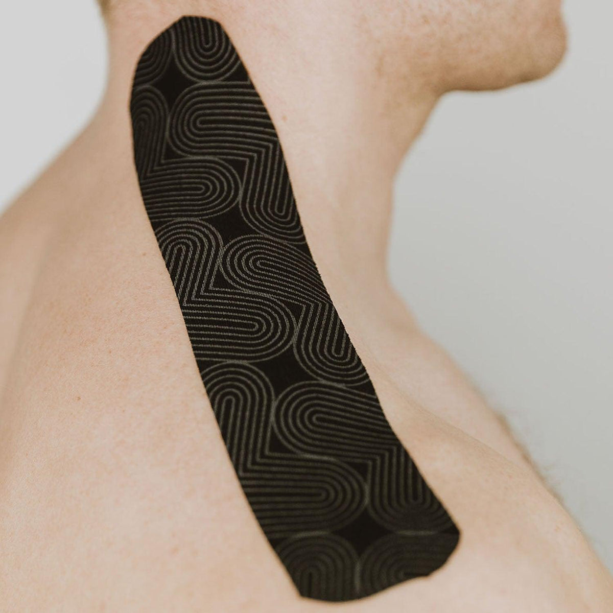 How to Kinesiology Tape the Upper Trapezius