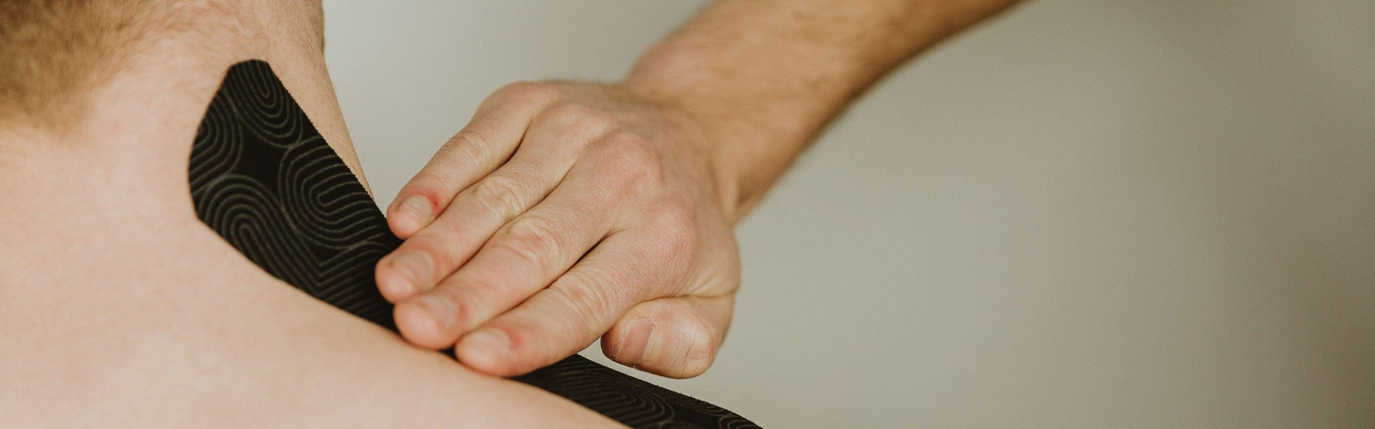 How to Kinesiology Tape the Upper Trapezius